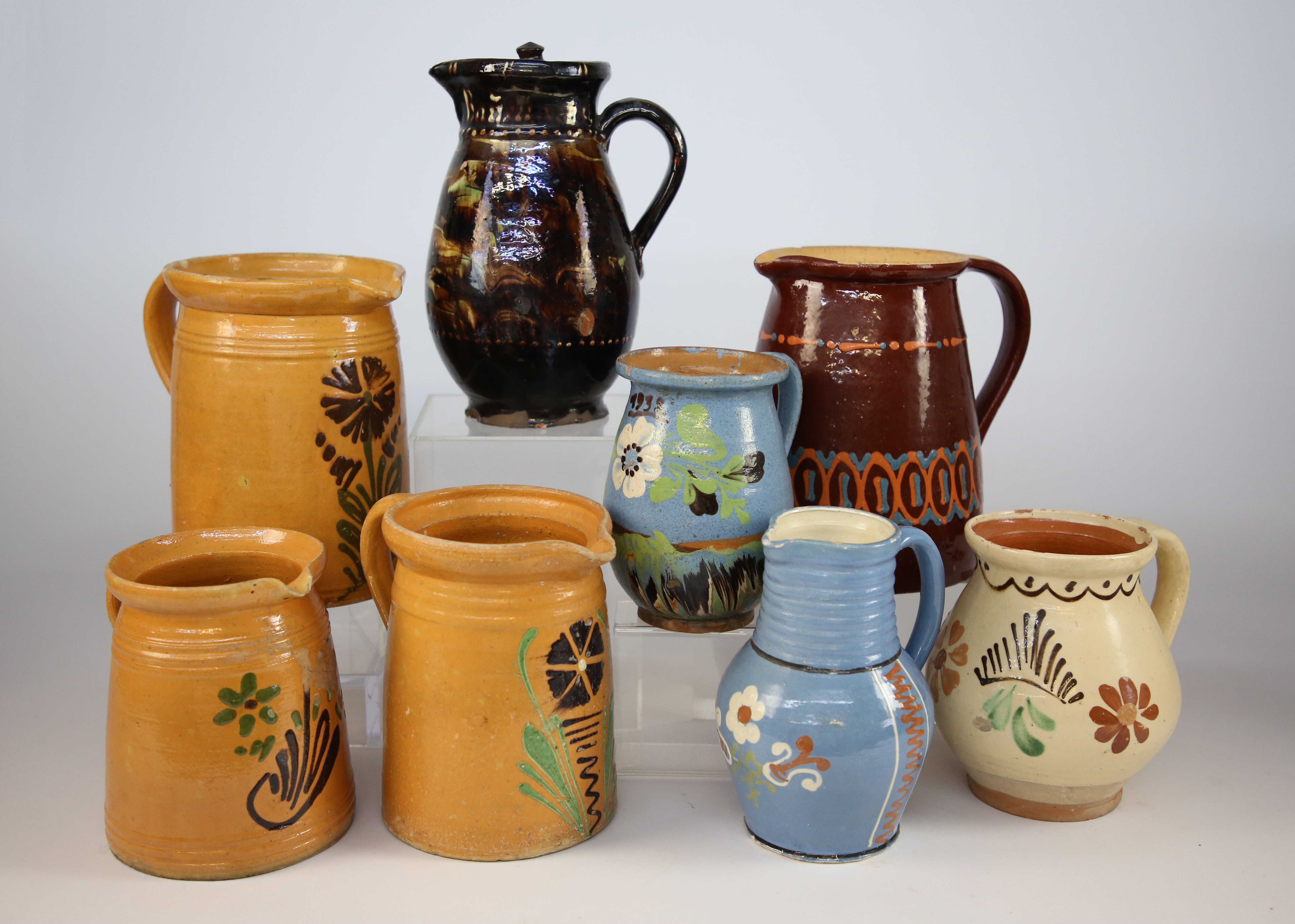 Collection of Eight Yellow-Ware Blue-Ware Splatterware Milk Pitchers ...