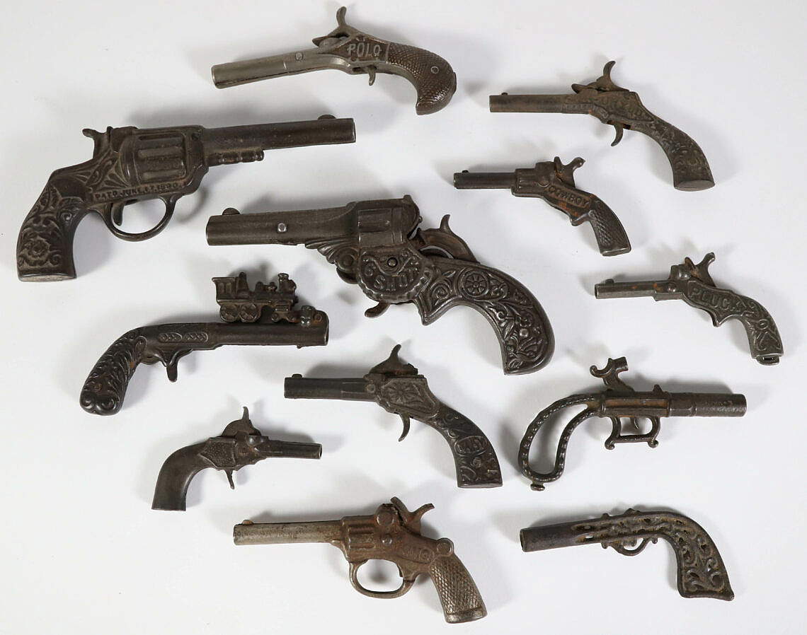 Collection of Twelve Antique American Cast Iron Cap Gun Toys 19th ...