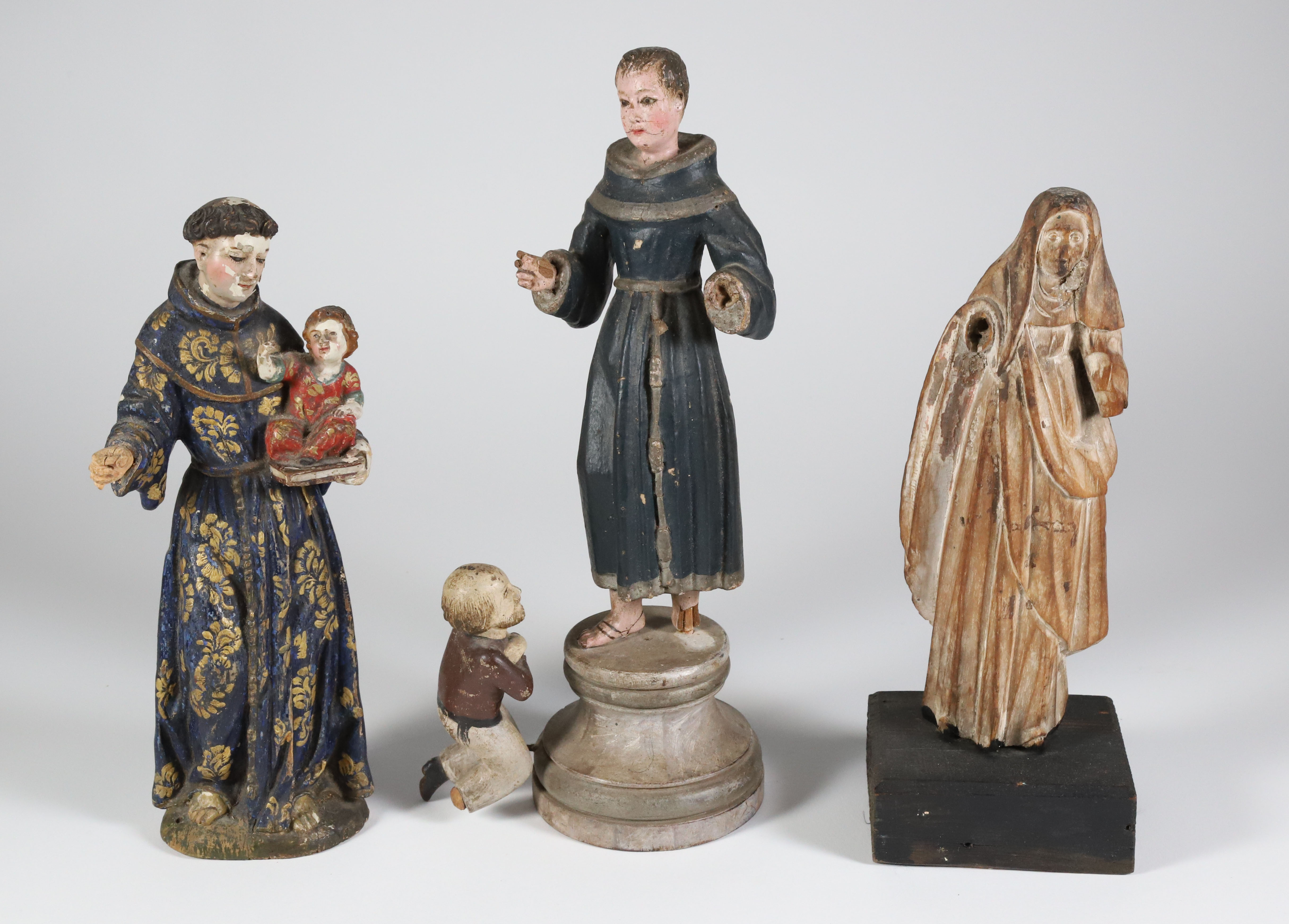 Three Polychrome Wood Carvings of Saints - Three Polychrome Wood ...