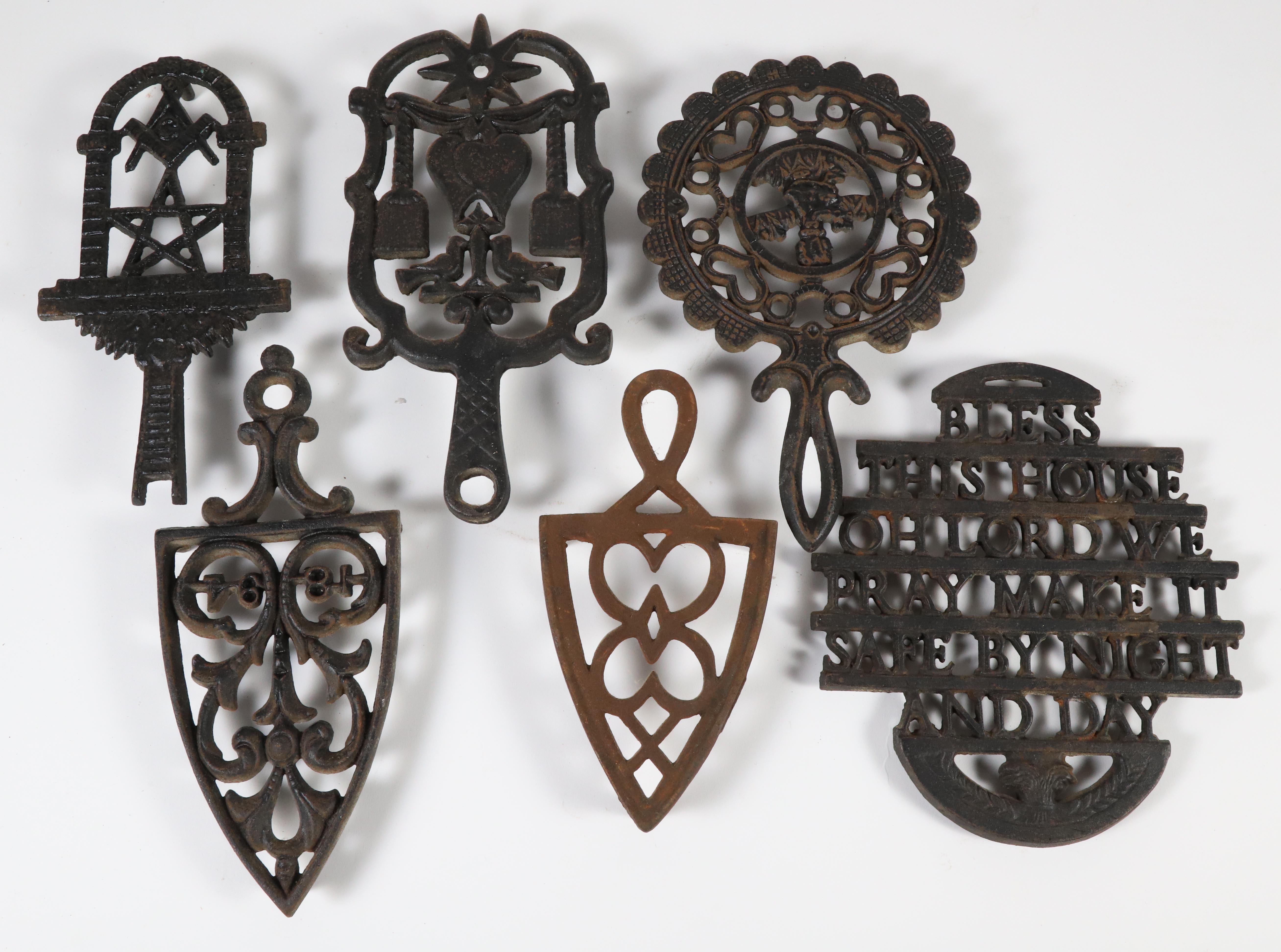 Collection of Six Sad Iron Trivets - Collection of Six Sad Iron Trivets ...